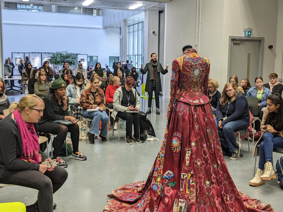 COE speech — The Red Dress