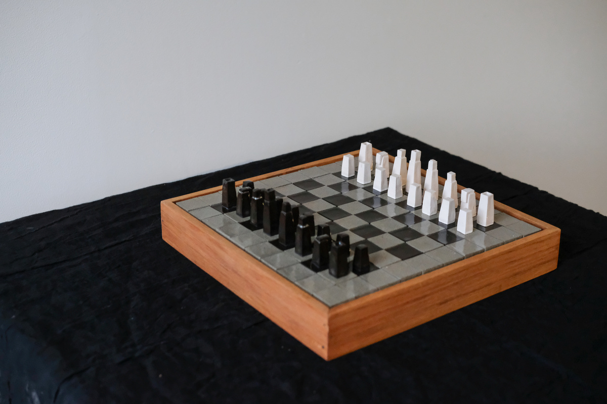 CERAMIC CHESS SET (10X10) IN RIMU FRAME,2022 — trantham gordon