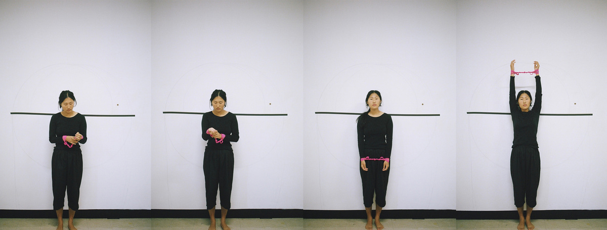 Durational performance with hand tie — lisa myeong-joo